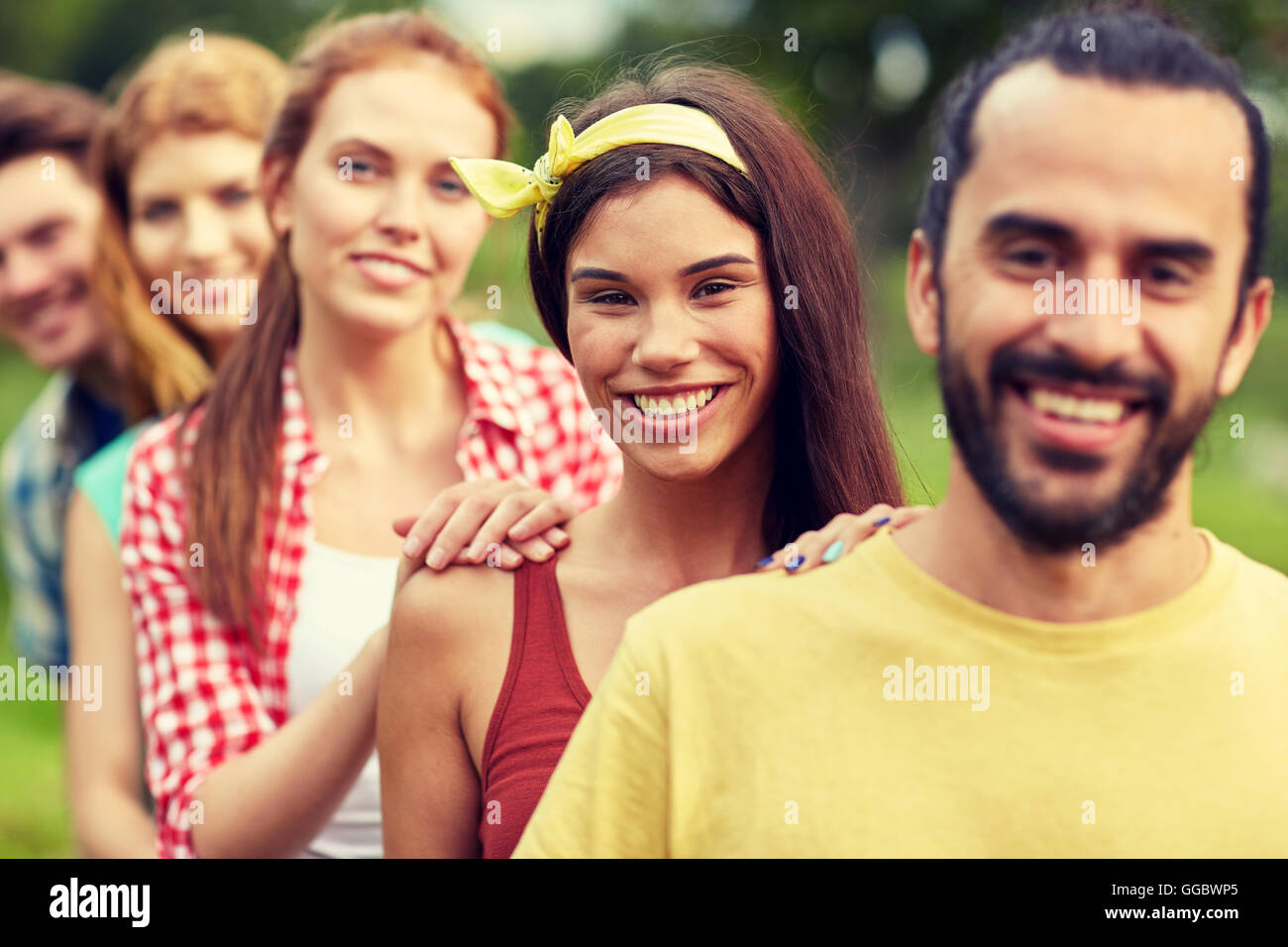 group of smiling friends outdoors Stock Photo - Alamy