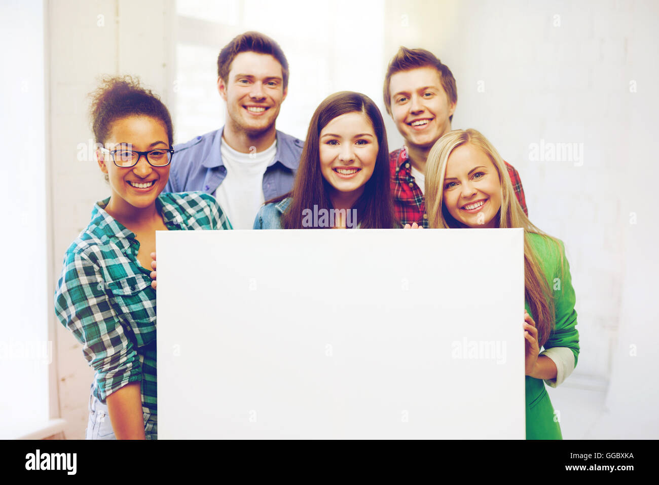 group of students at school with blank board Stock Photo - Alamy