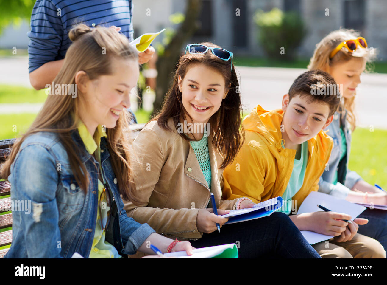 group of students with notebooks at school yard Stock Photo - Alamy