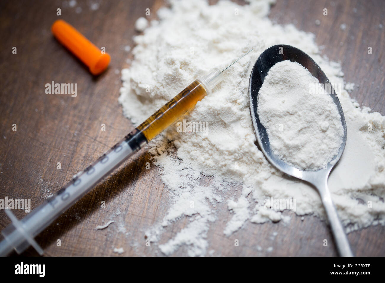 close up of spoon and syringe with drug dose Stock Photo - Alamy