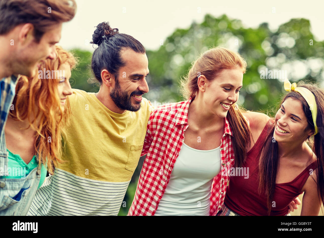 group of smiling friends outdoors Stock Photo - Alamy