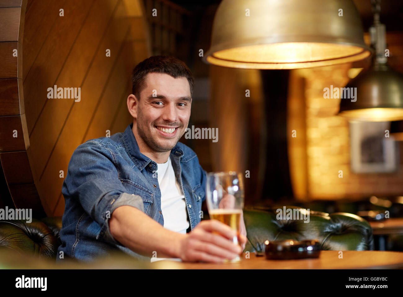 Happy man drinking draft beer hi-res stock photography and images - Alamy