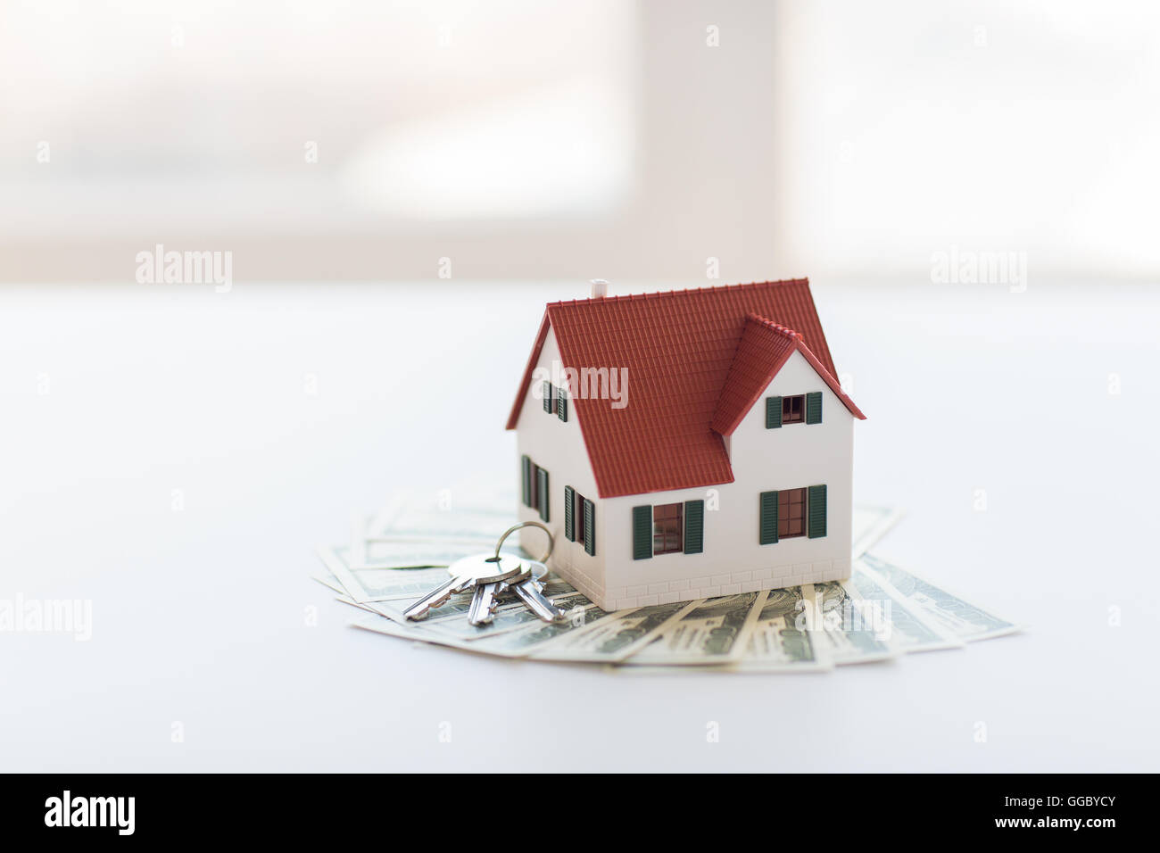 close up of home model, money and house keys Stock Photo - Alamy