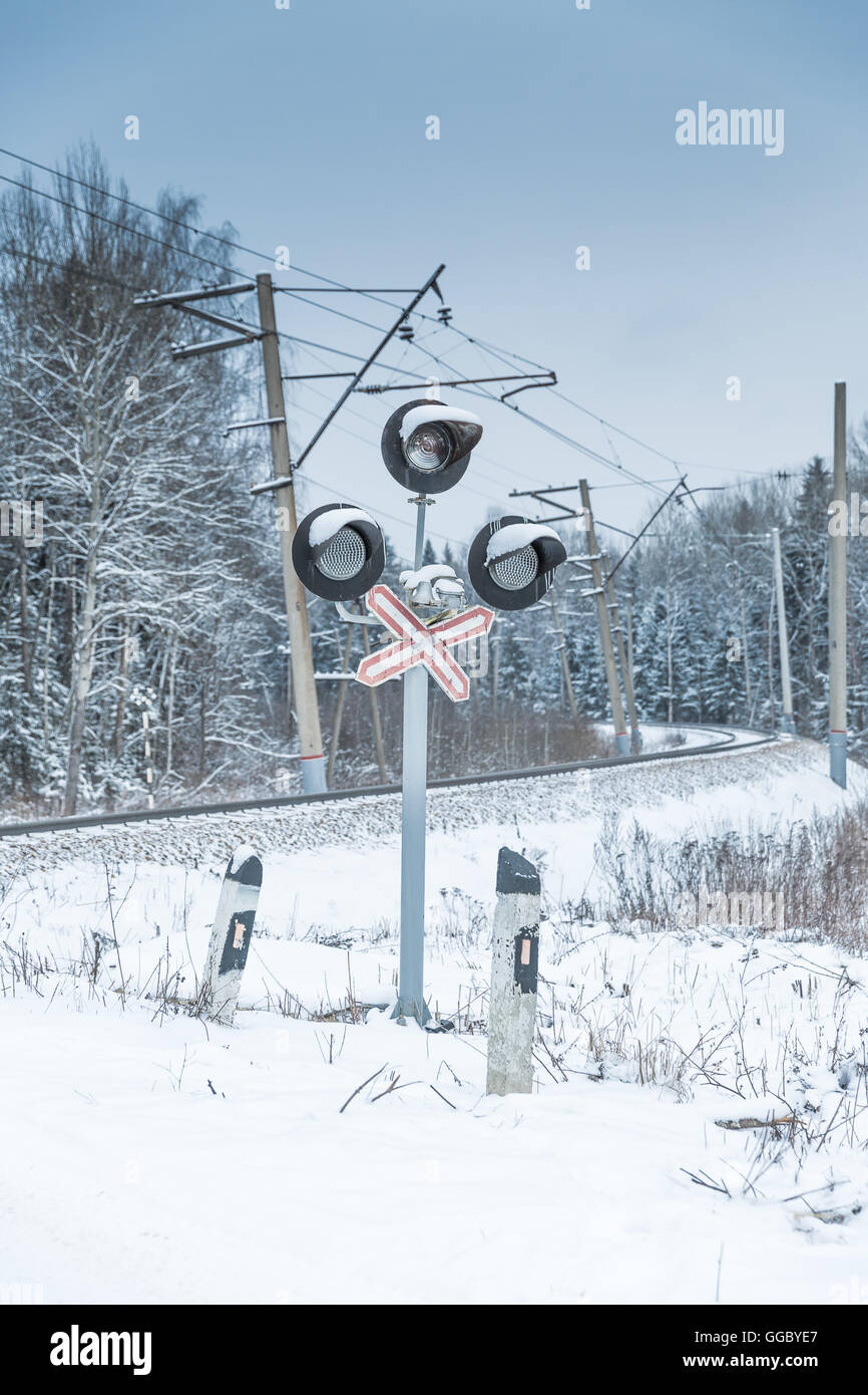 Snow covered railway crossing Stock Photo - Alamy