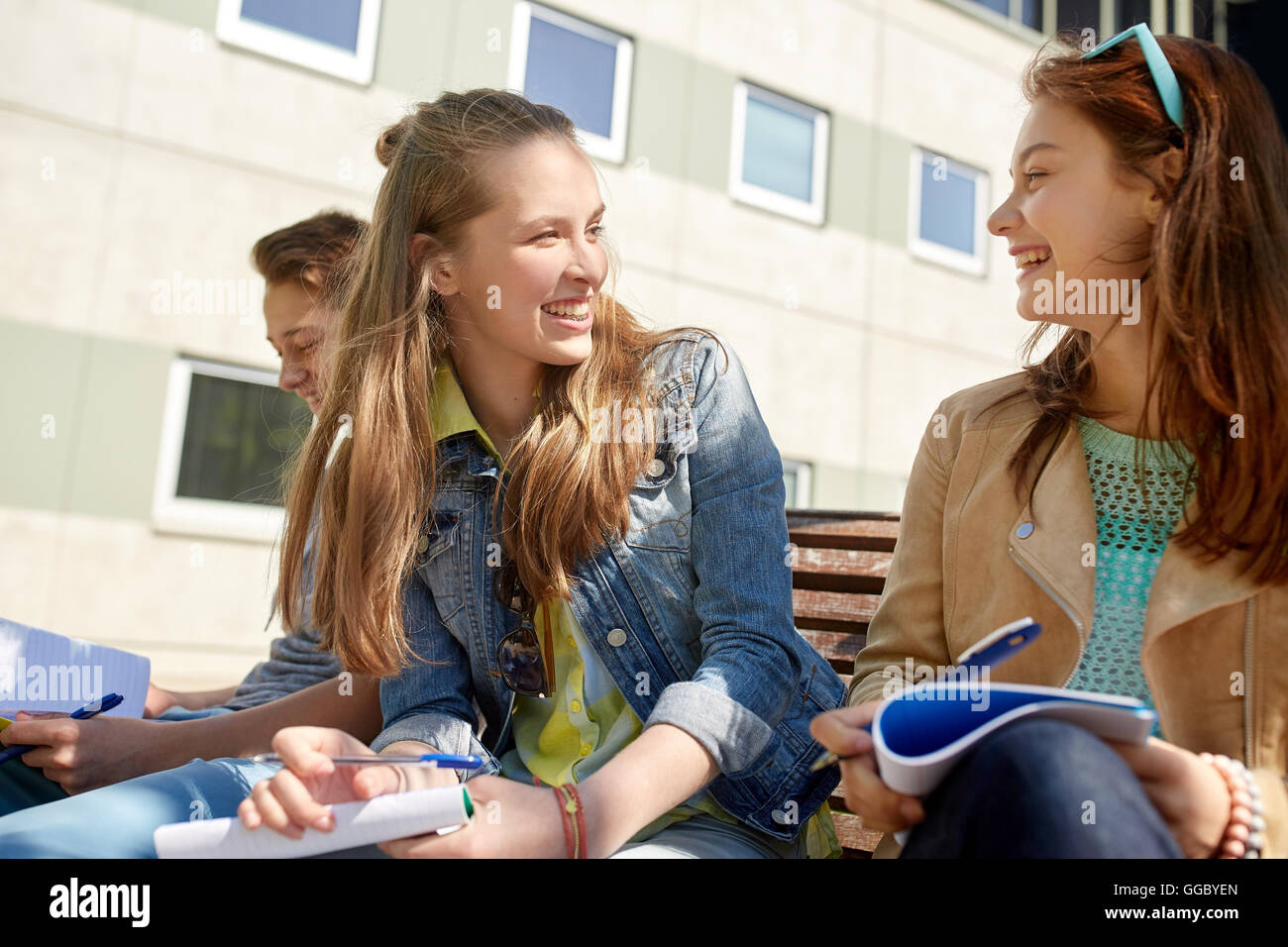 group of students with notebooks at school yard Stock Photo - Alamy