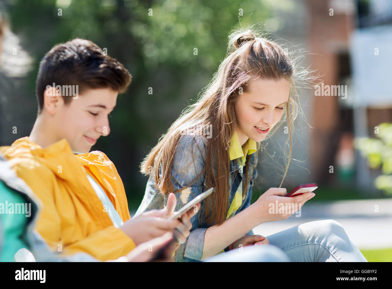 Teen boy with gadgets hi-res stock photography and images - Alamy