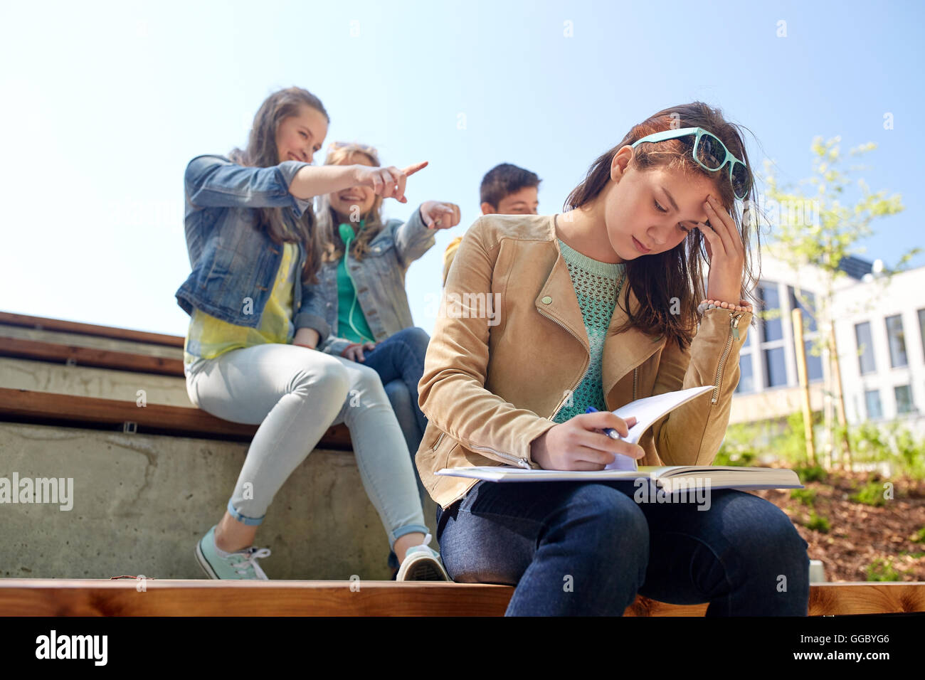 student girl suffering of classmates mockery Stock Photo - Alamy