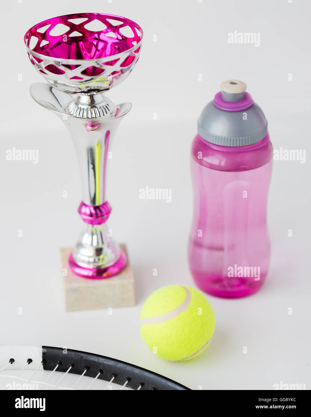 close up of tennis racket, ball, cup and bottle Stock Photo - Alamy