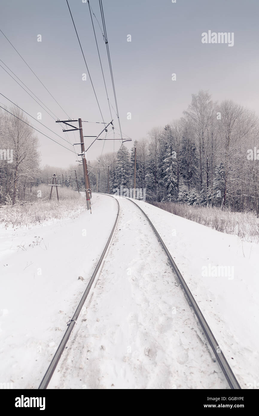 Snow covered railway crossing Stock Photo - Alamy
