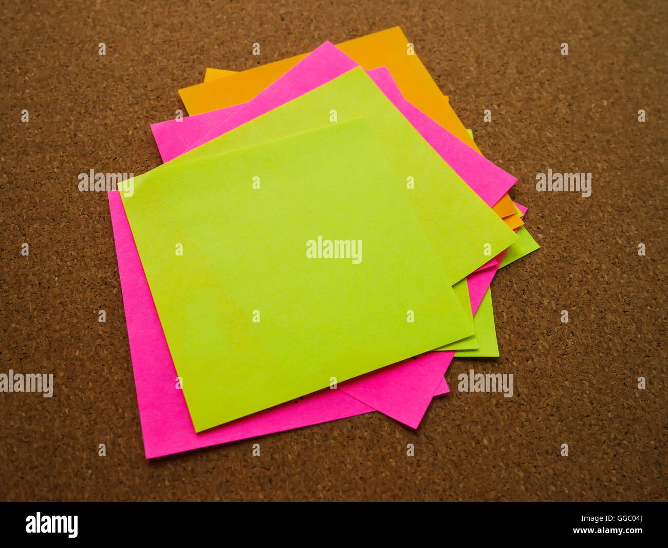 Many and colorful post note attach on wood board Stock Photo - Alamy