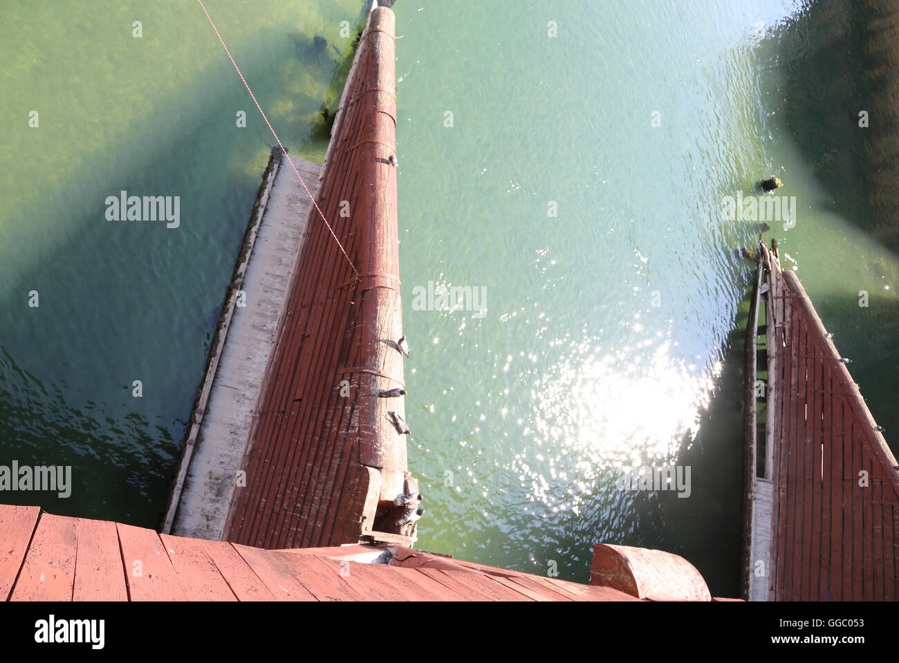 Detail of the old broken wooden bridge in Italy Stock Photo - Alamy