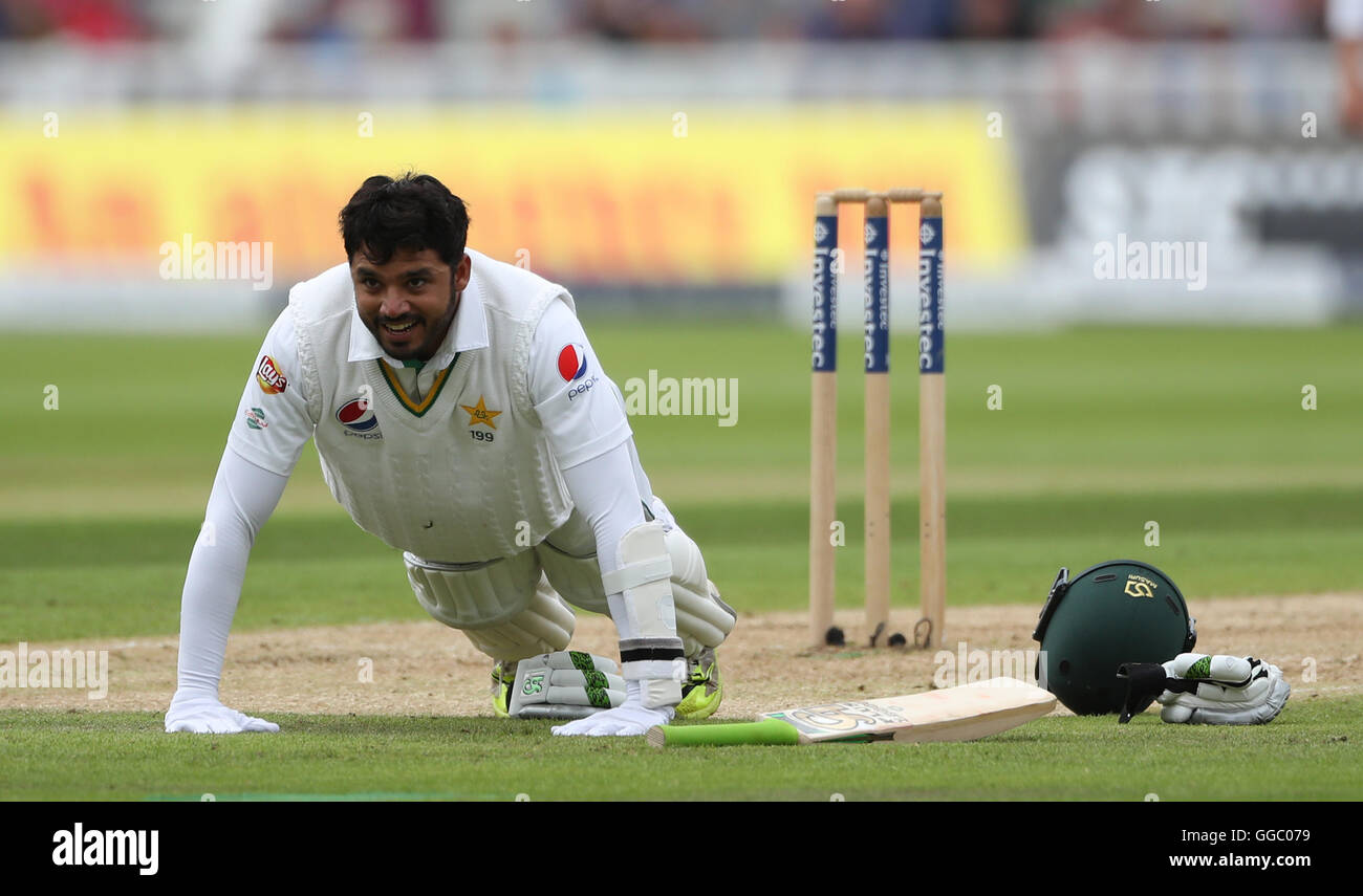 Pakistan batsman Azhar Ali celebrates his 100 not out by doing press ...