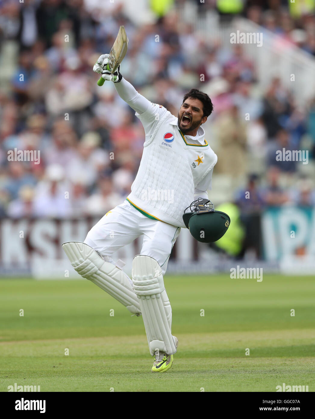 Pakistan batsman Azhar Ali celebrates his 100 not out during day two of ...