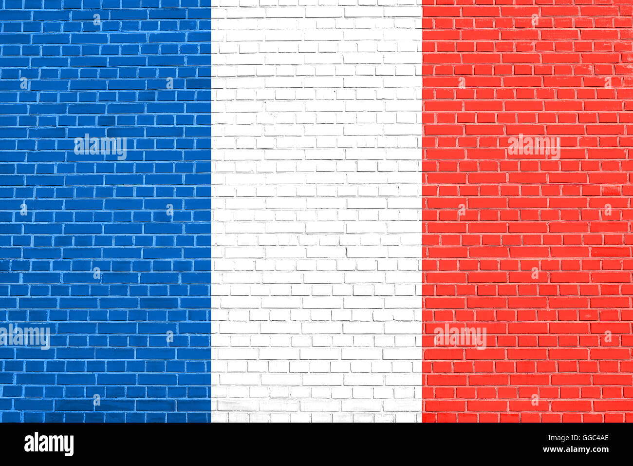 Flag of France on brick wall texture background. French national flag ...