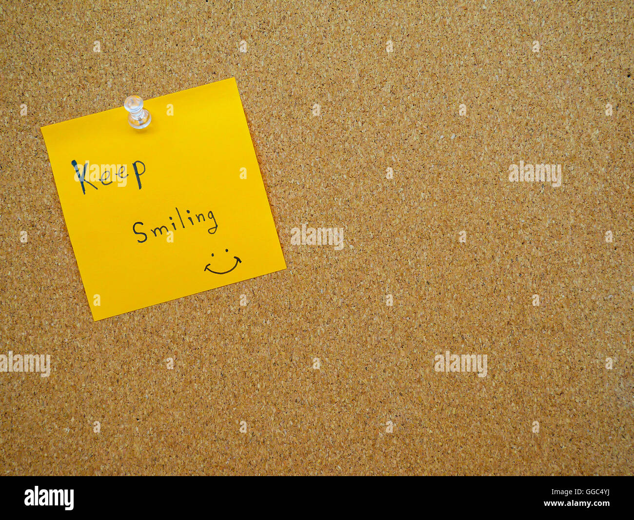 Keep smiling in post note on wooden board with copy space Stock Photo ...