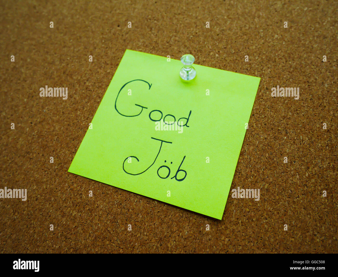 Good job in post note on wooden board Stock Photo - Alamy