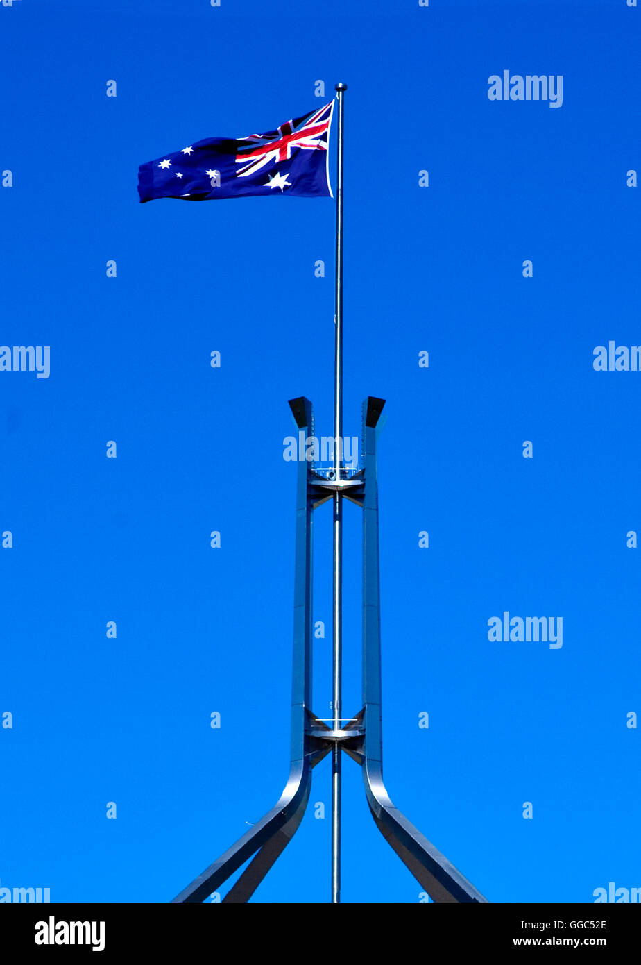 Giant flag dominates the roof of Australia's Parliament House in ...