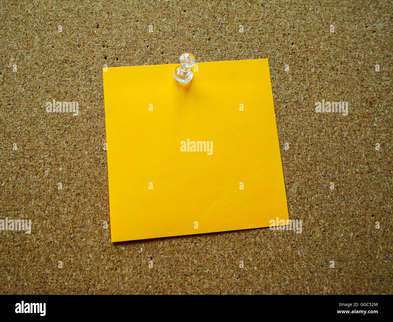 Orange post it note on wooden board Stock Photo - Alamy