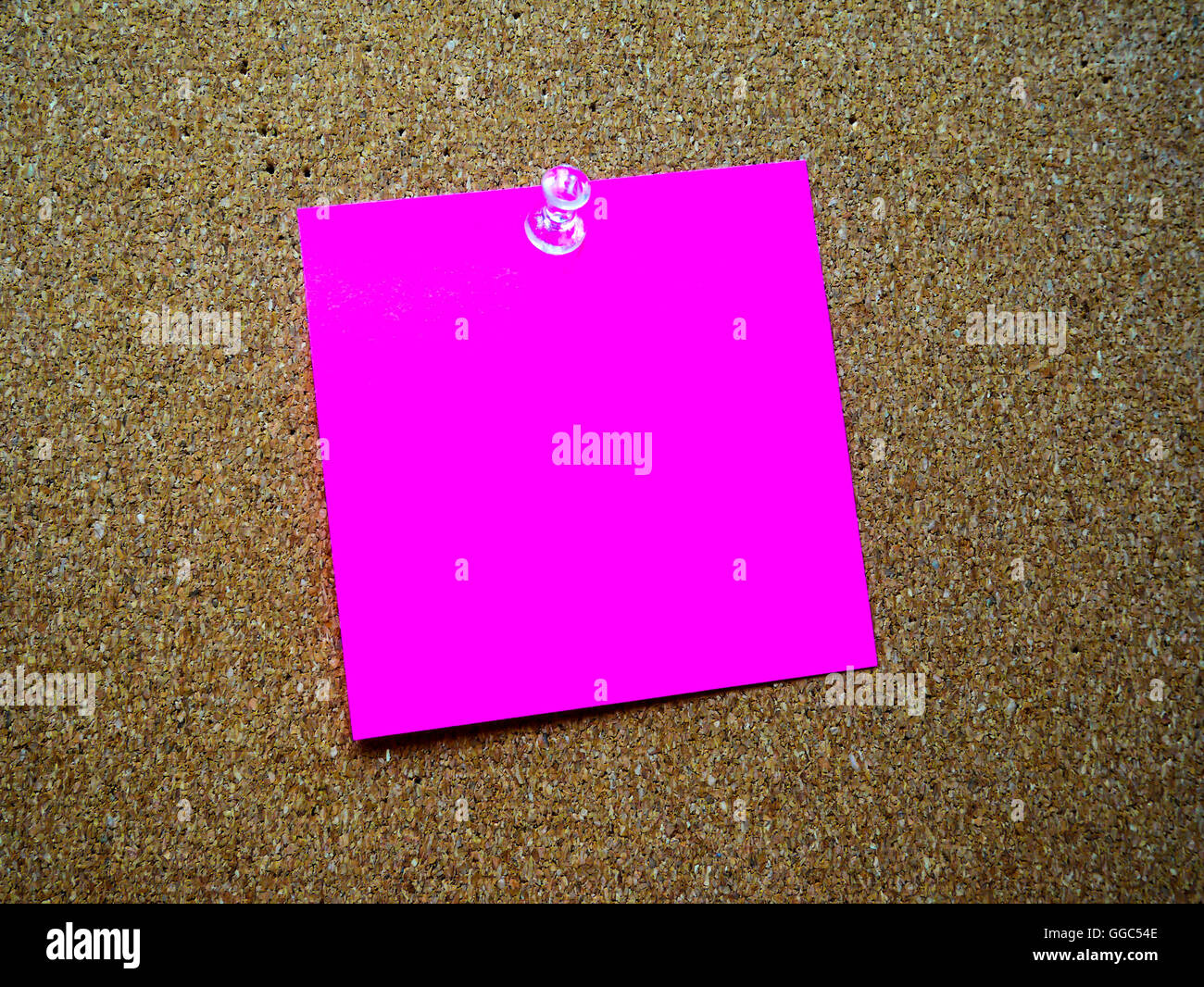 Pink post it note on wooden board Stock Photo - Alamy
