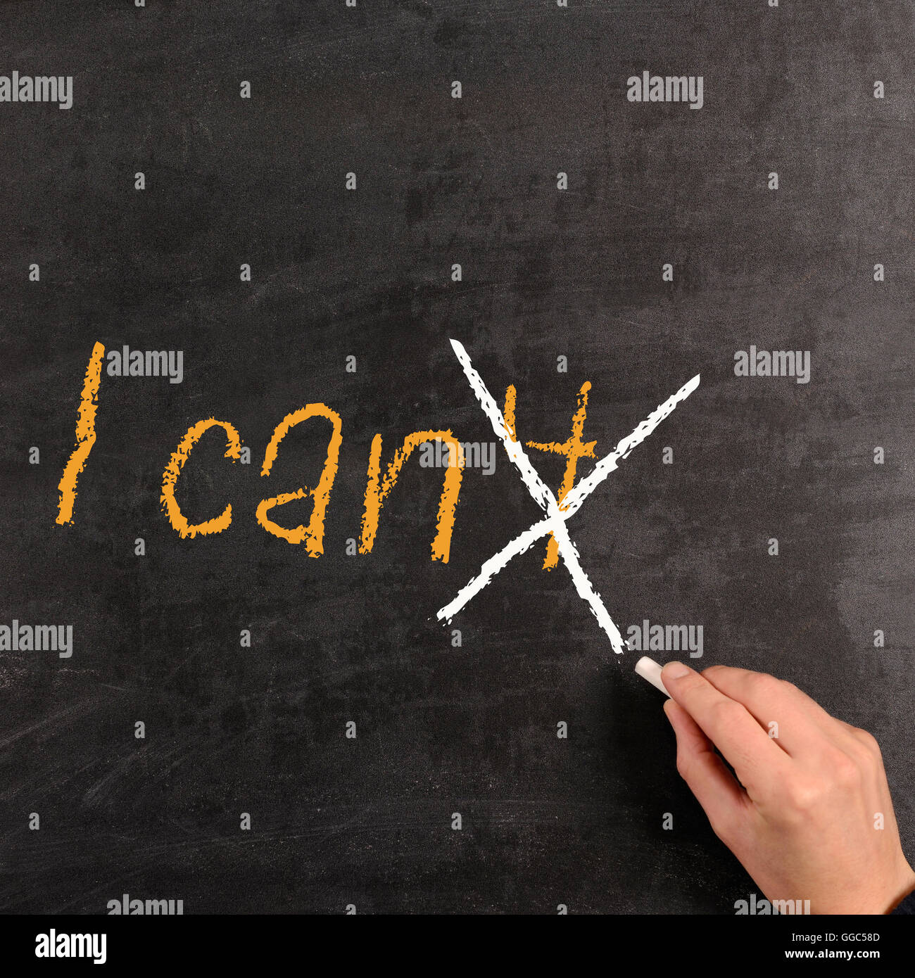 Hand writing with chalk on a blackboard the words "I can Stock Photo ...