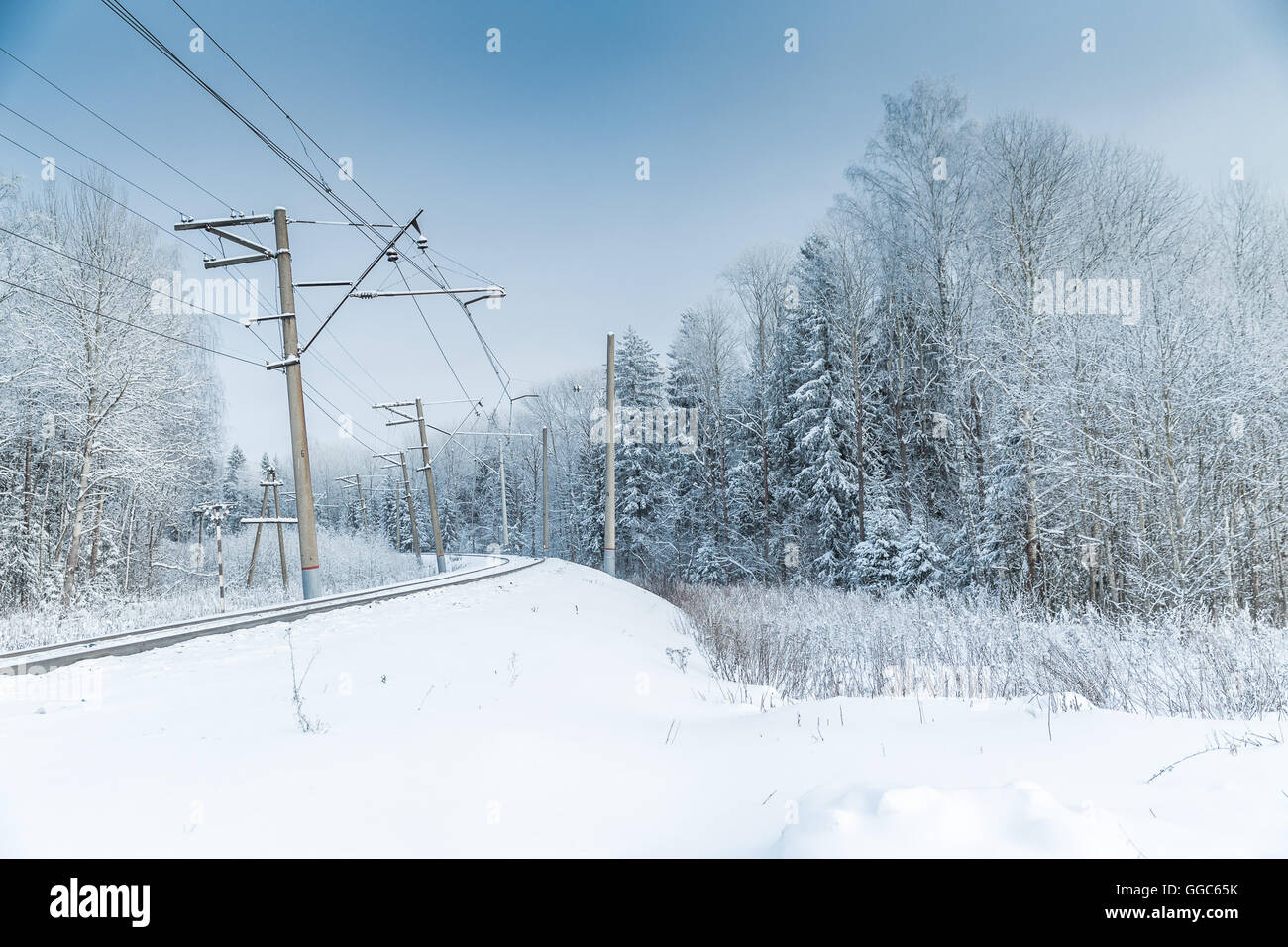 Snow covered railway crossing Stock Photo - Alamy
