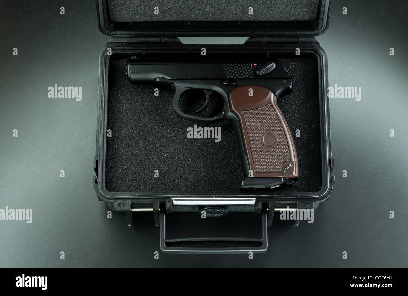 gun in the suitcase Stock Photo - Alamy
