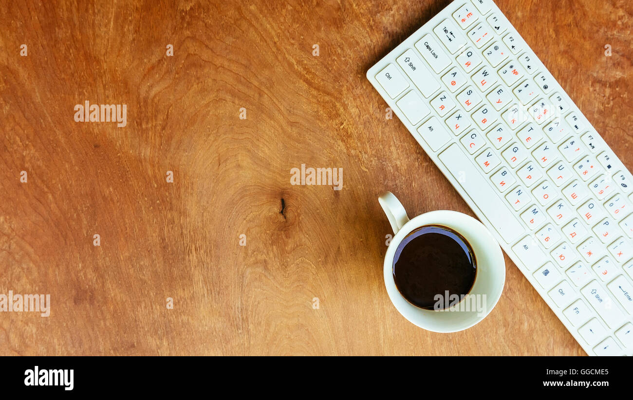 Office desk table with computer, supplies and coffee cup. coffee ...