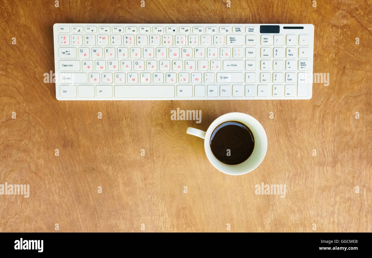 Office desk table with computer, supplies and coffee cup. coffee ...