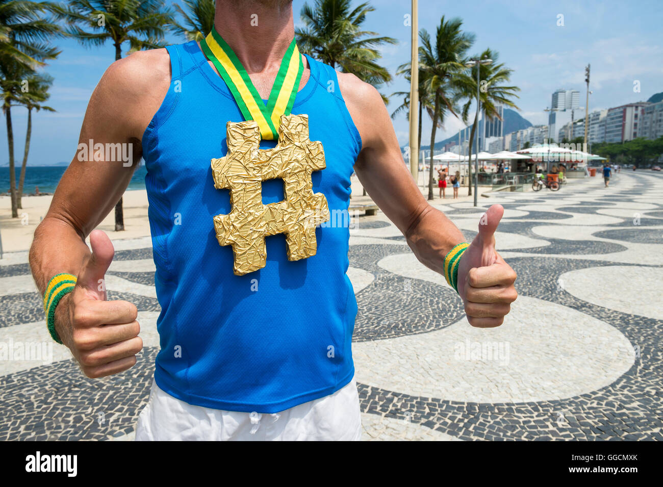 Athlete with hashtag gold medal standing on the patterned tiles of the ...