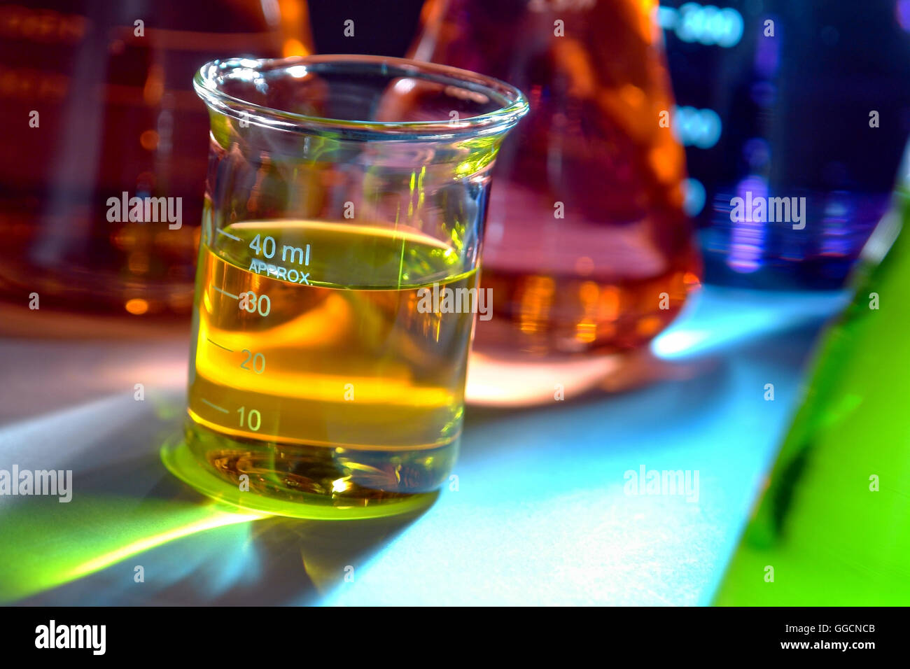 Laboratory scientific laboratory glass beaker filled with yellow liquid ...