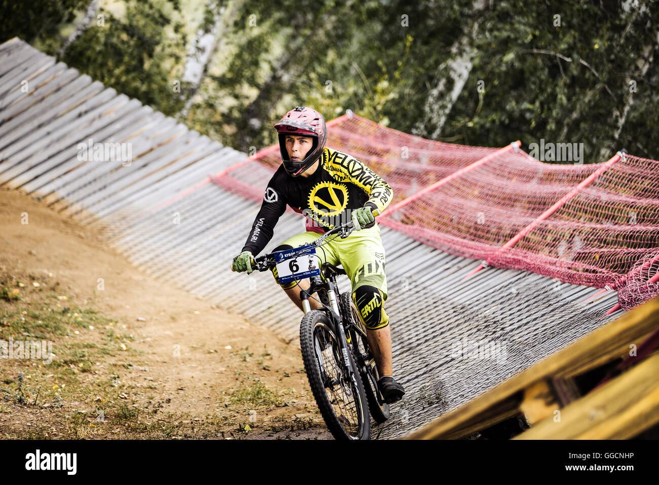 athlete man extreme cyclist riding Insloped Turn during National ...