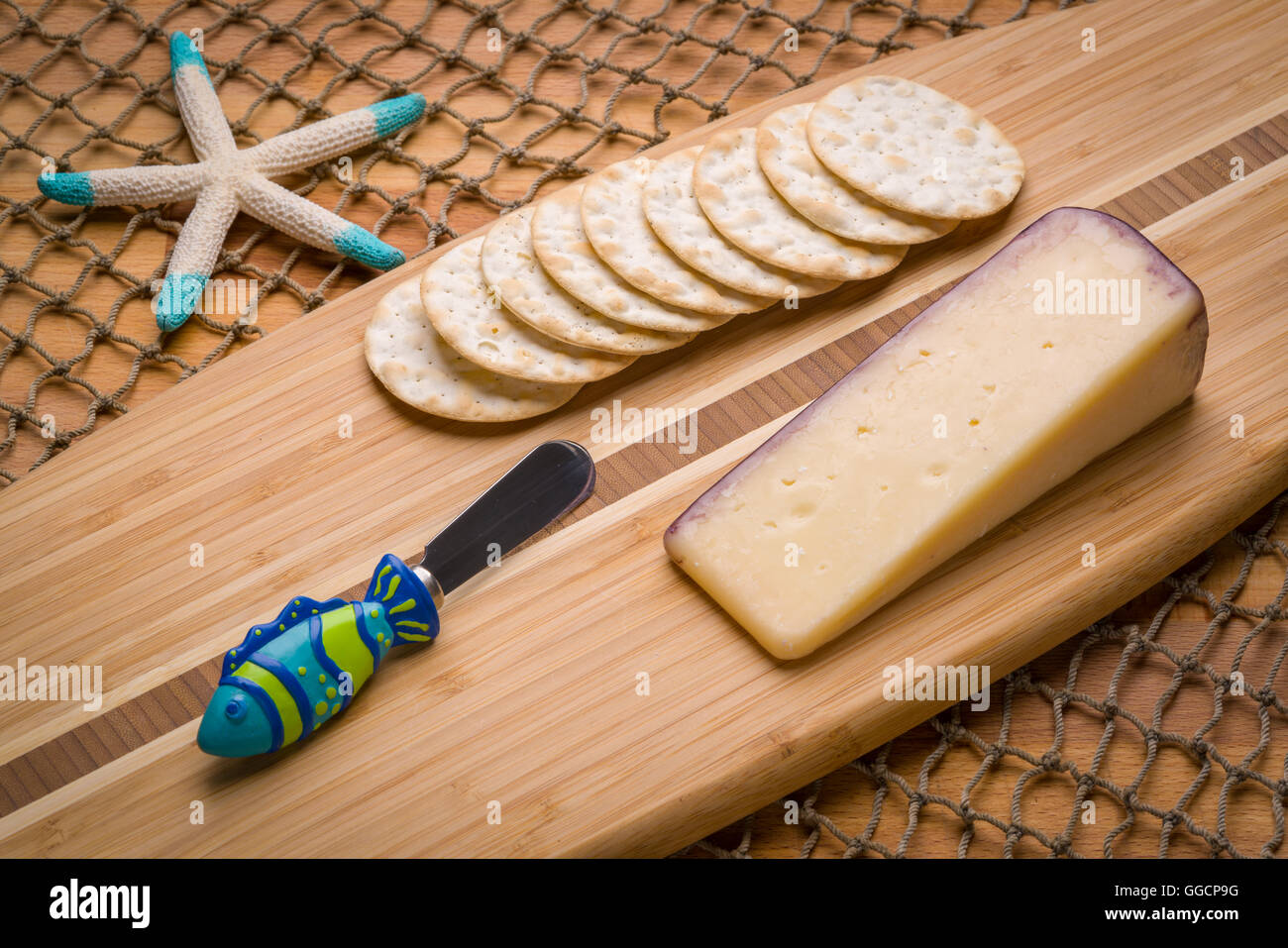 Nautical themed merlot flavored cheese with crackers Stock Photo - Alamy
