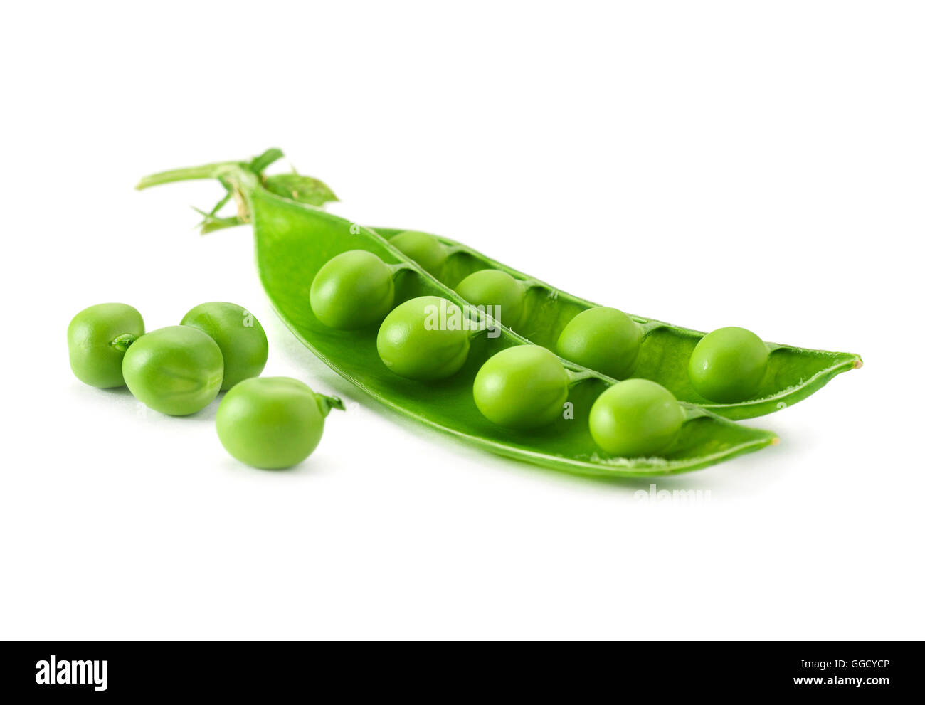 Young grean peas closeup isolated on white background Stock Photo - Alamy