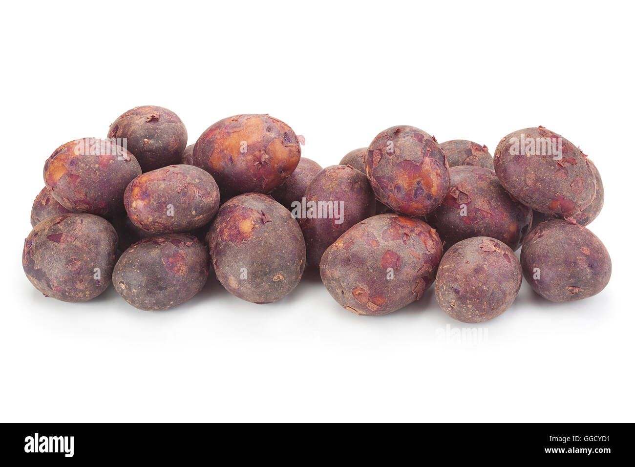 Young raw purple potatoes isolated on white background Stock Photo - Alamy