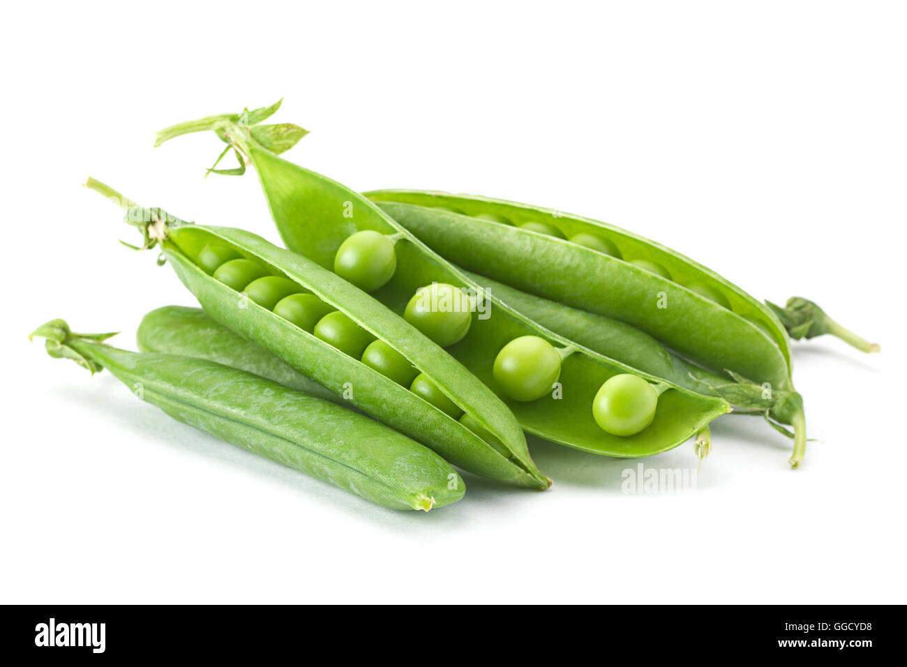Young grean peas closeup isolated on white background Stock Photo - Alamy