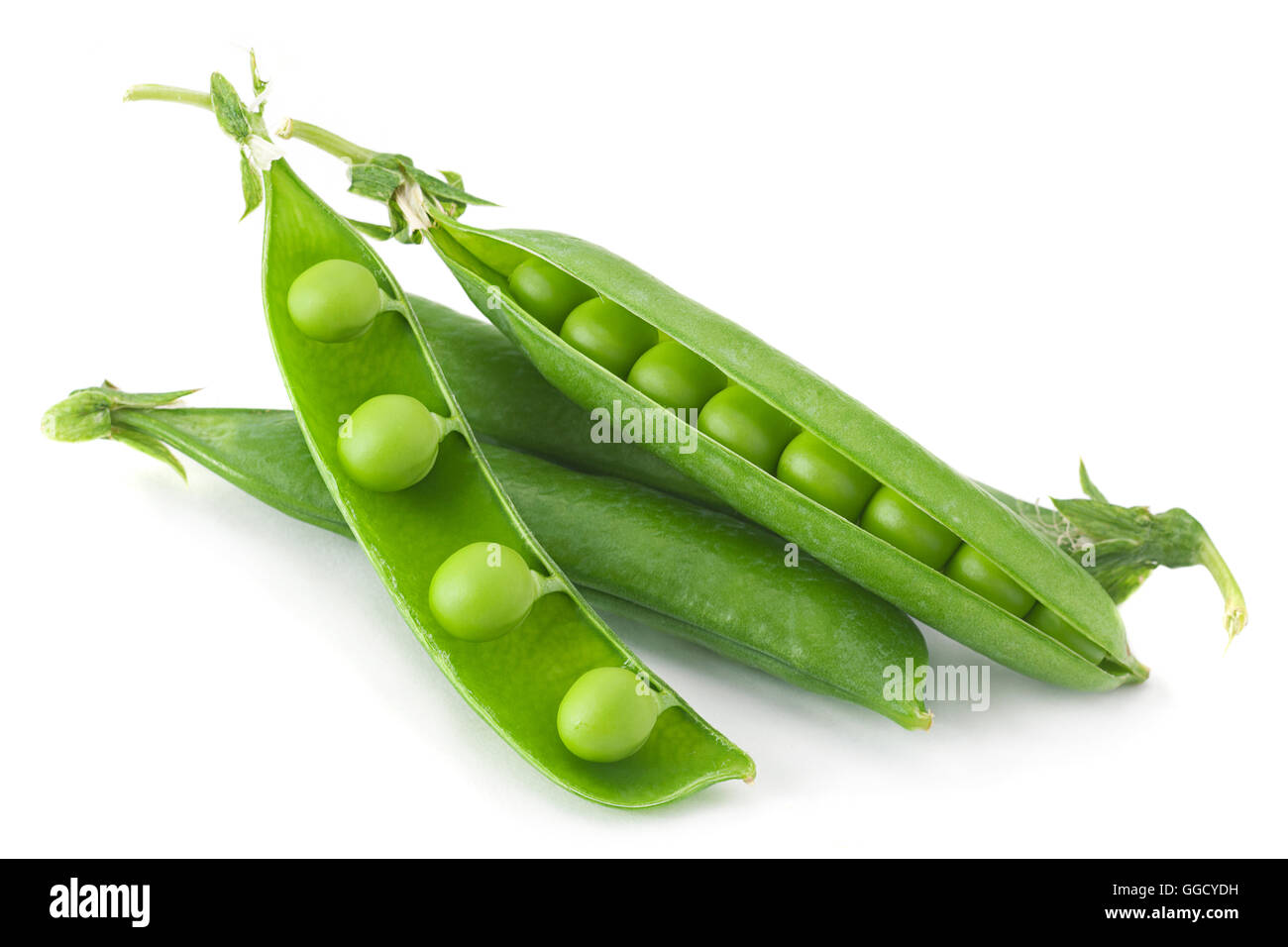 Young grean peas closeup isolated on white background Stock Photo - Alamy