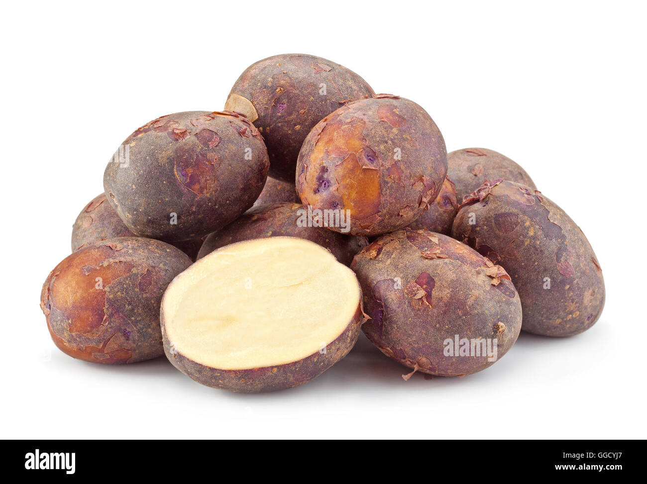 Young raw purple potatoes isolated on white background Stock Photo - Alamy