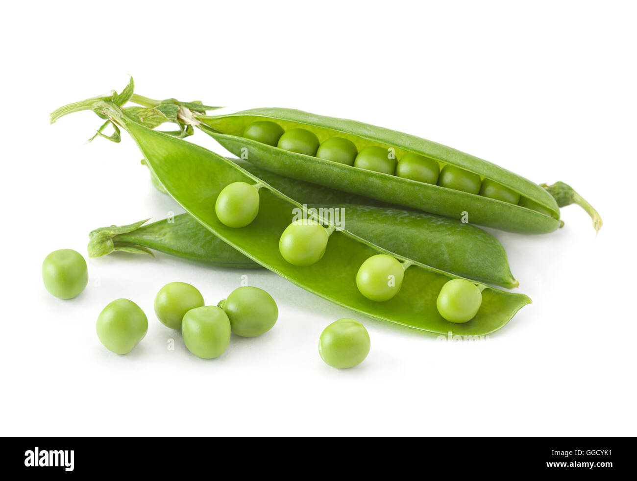 Young grean peas closeup isolated on white background Stock Photo - Alamy