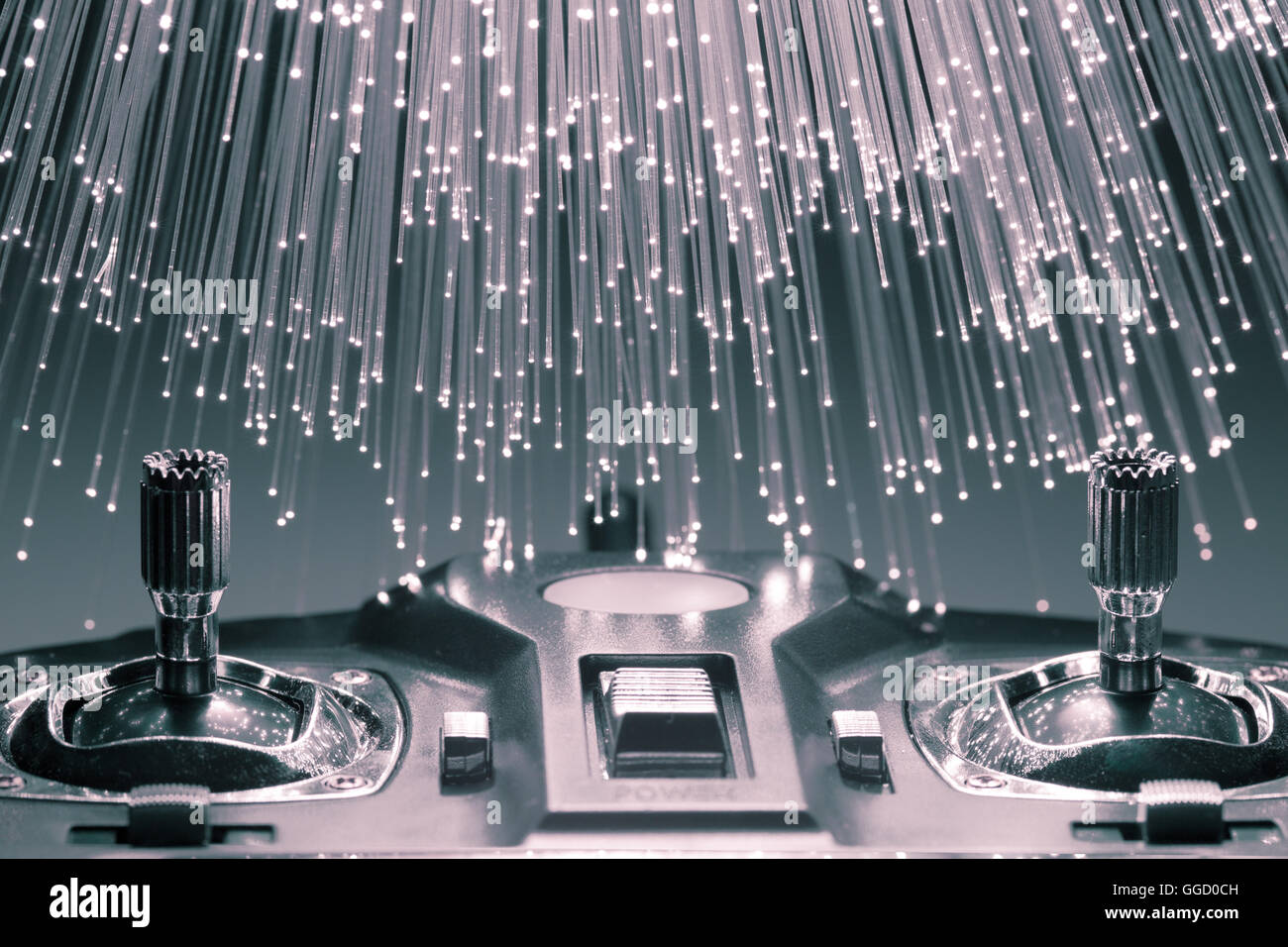 Fiber optics background with remote controll Stock Photo - Alamy