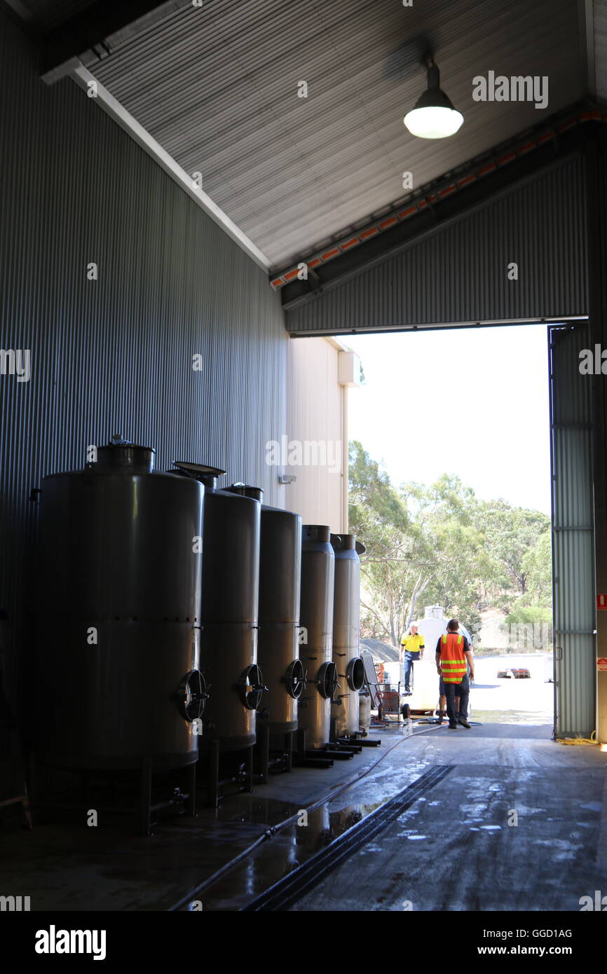 wine tanks and winemaking workers in the winery at Two Hands Wines ...
