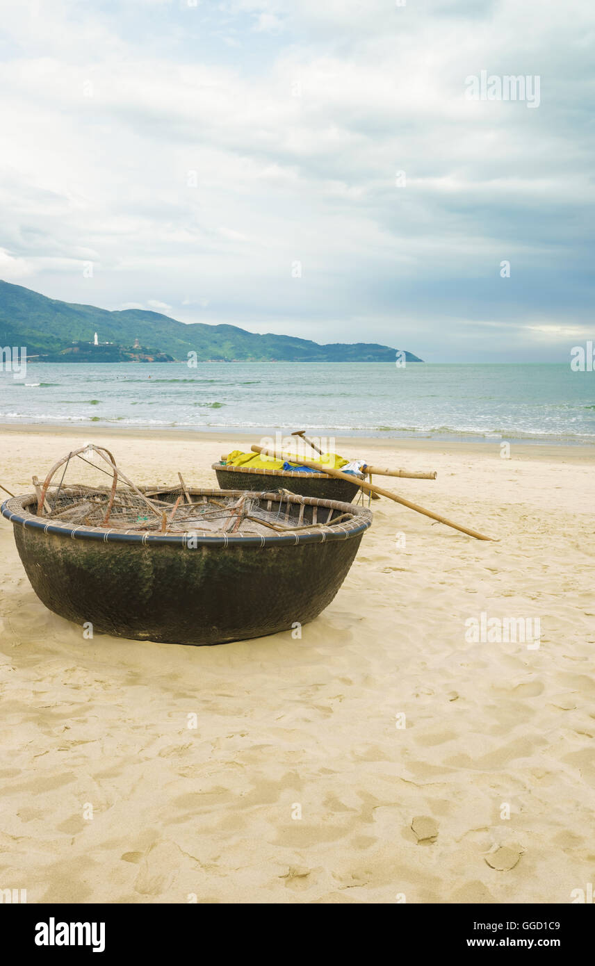 Bamboo waterproof round fishing boat on the China Beach, in Danang in ...