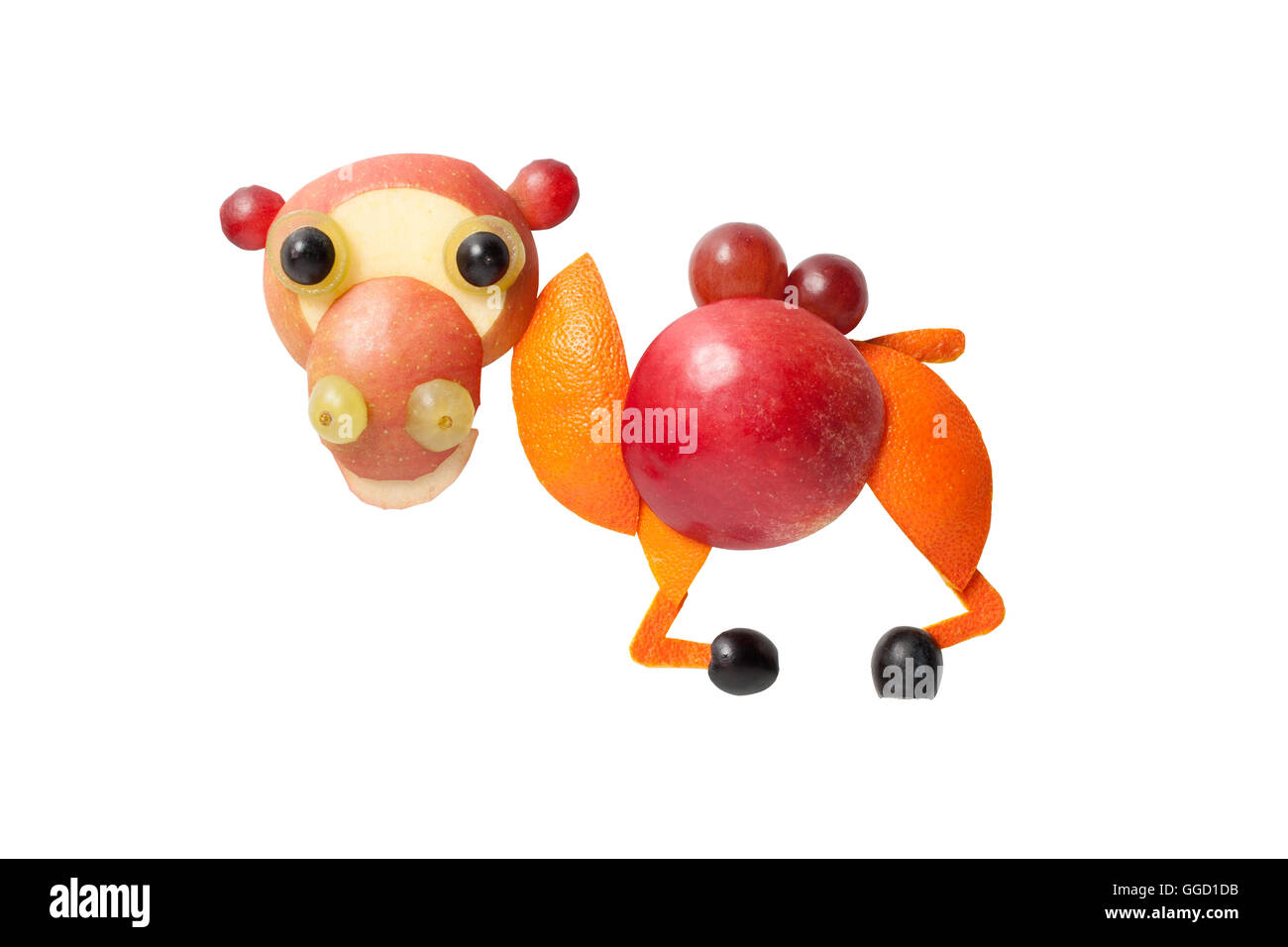 Amusing camel made of fruits on isolated background Stock Photo - Alamy
