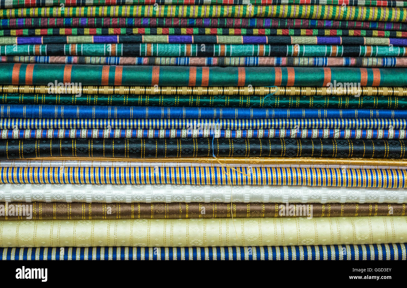 Heap of fabrics in textile shop on market in Old Town of Jerusalem ...