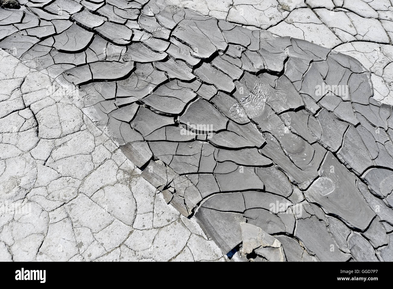 Landscape with cracked earth near mud volcanoes also known as mud domes ...