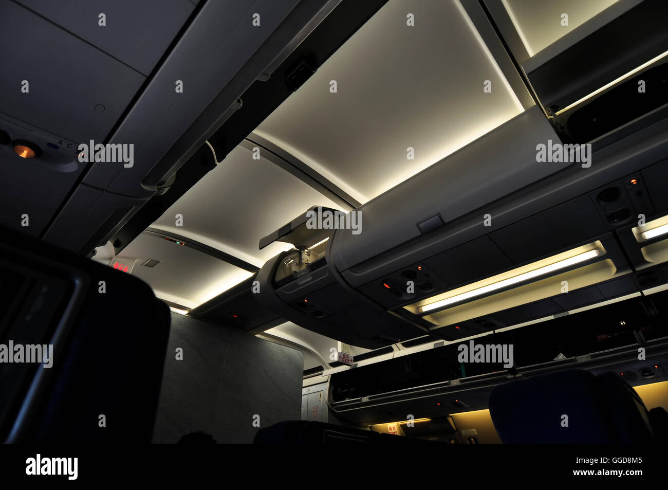 Overhead luggage racks hi-res stock photography and images - Alamy