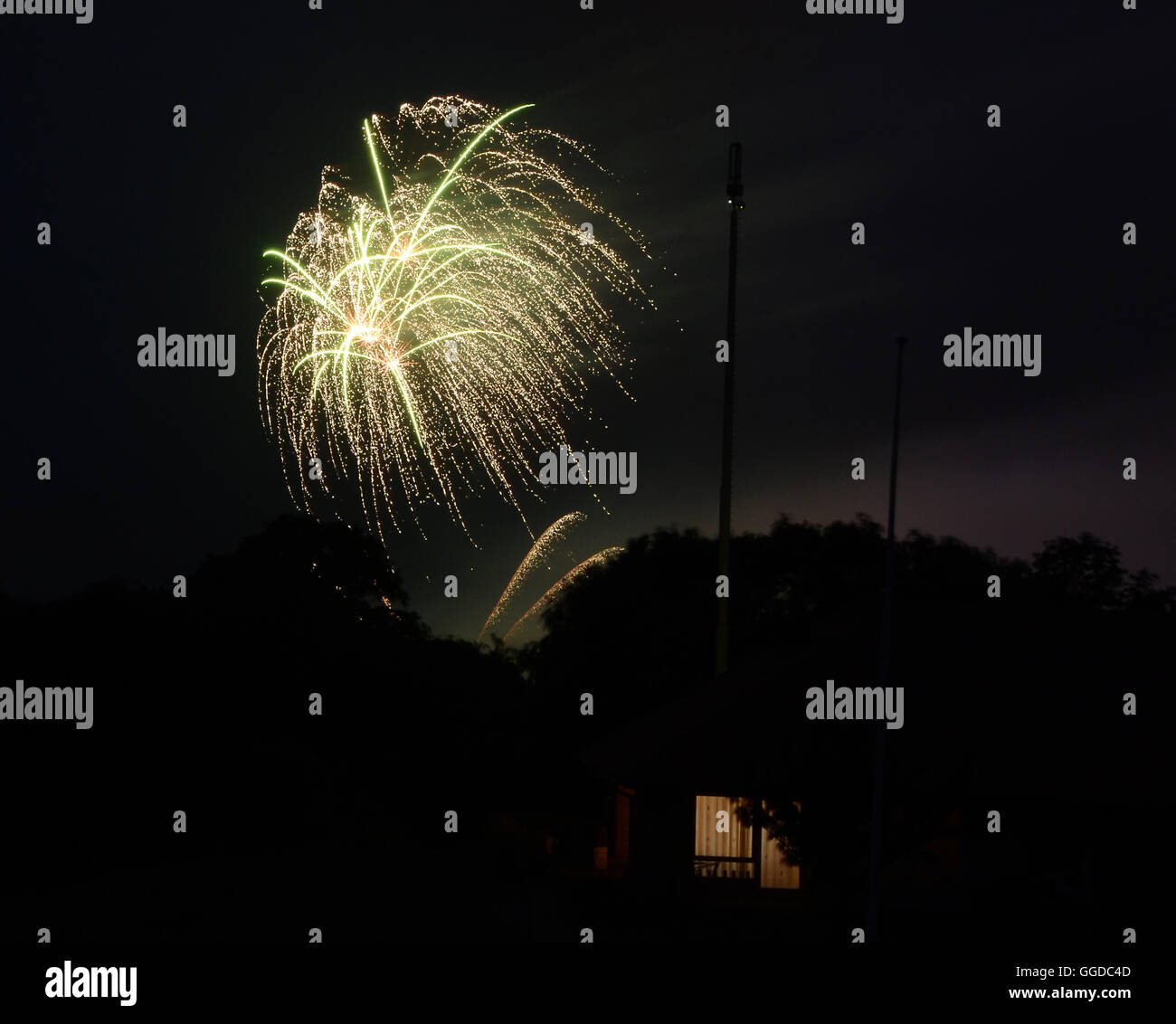 A large firework show in a dark sky Stock Photo - Alamy