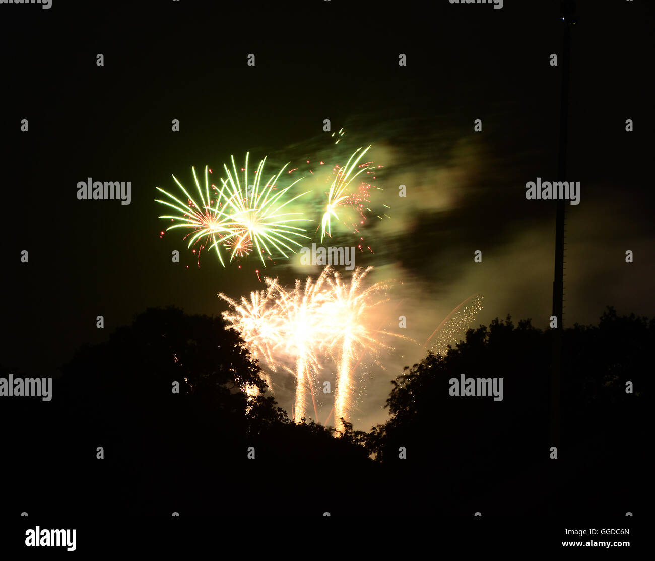 A large firework show in a dark sky Stock Photo - Alamy