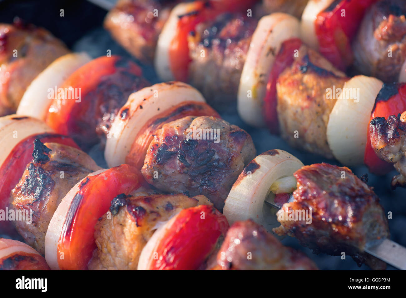 Barbecue with delicious grilled meat Stock Photo - Alamy