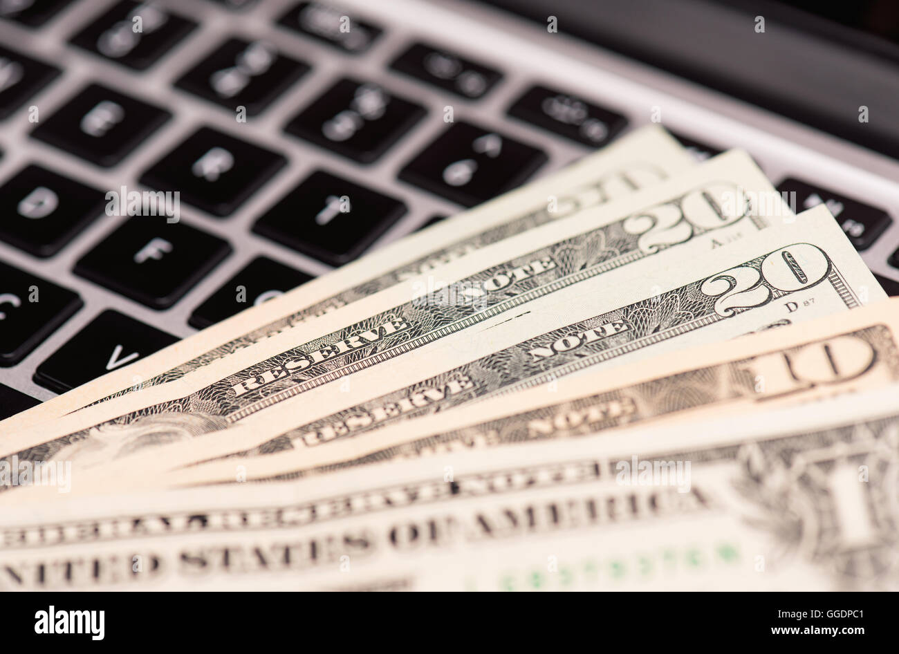 Money and electronic devices Stock Photo - Alamy