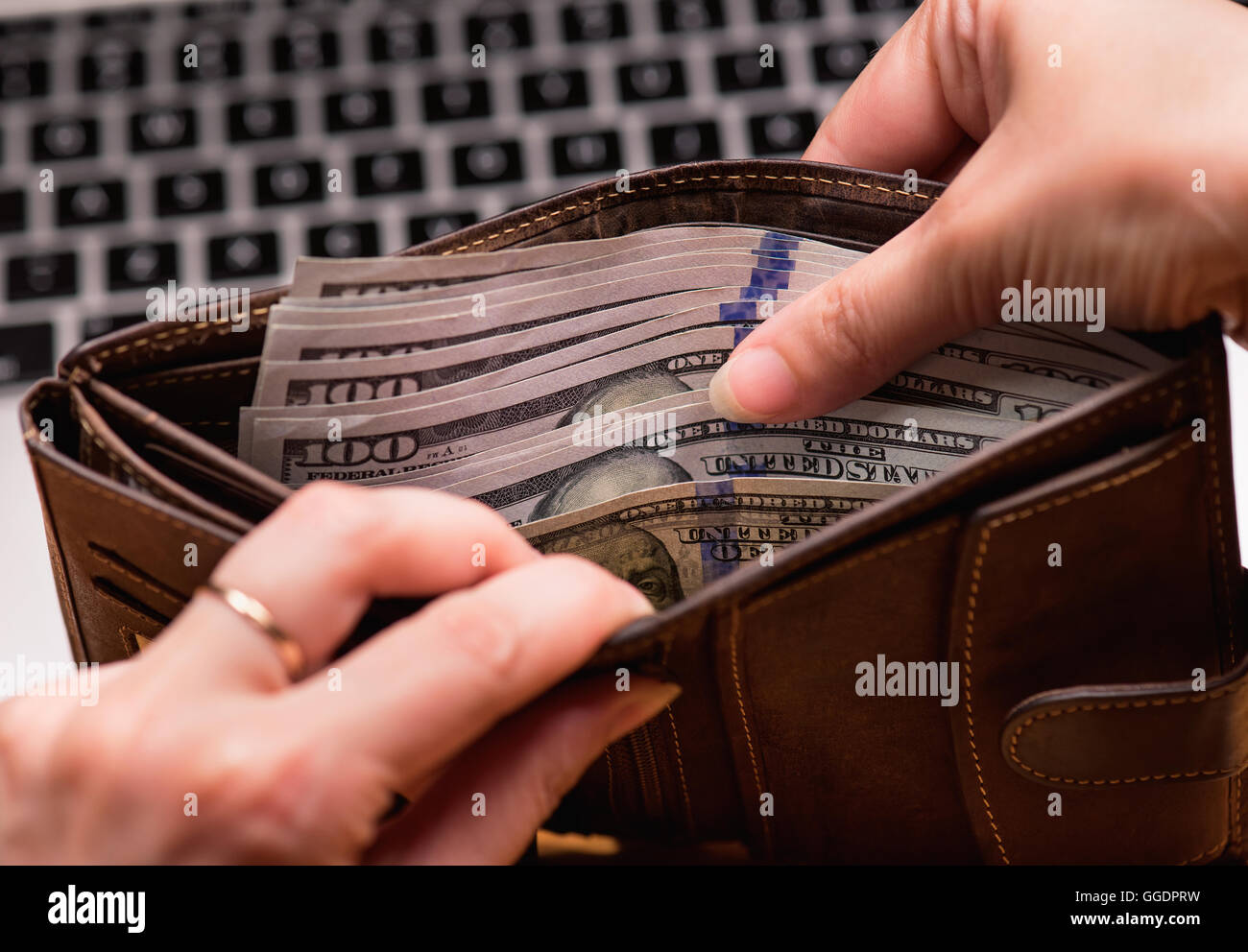 Woman earning money hi-res stock photography and images - Alamy